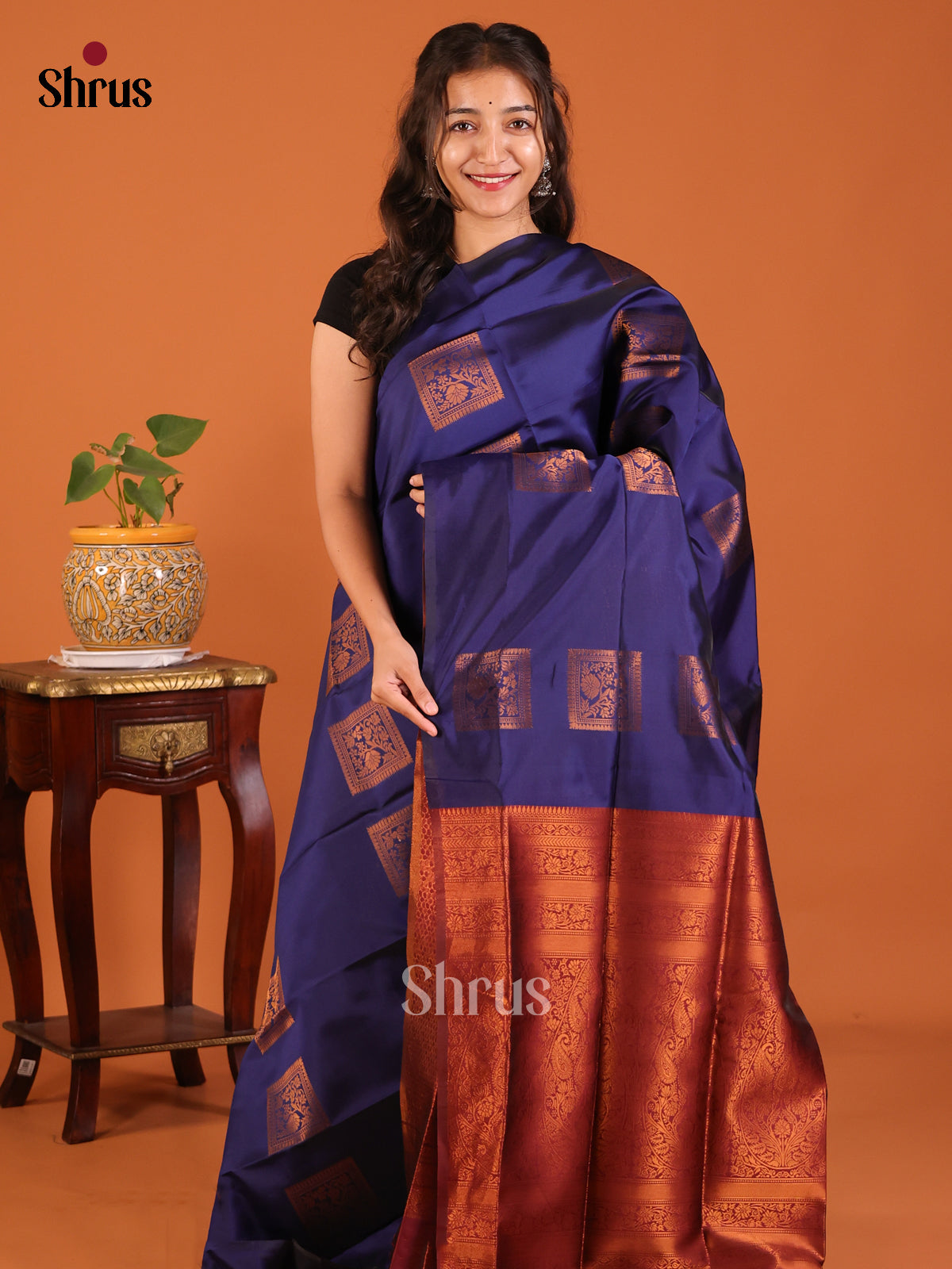 Vibrant Blue borderless Semisoft silk Saree with block motifs , zari b